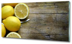 Wallmuralia Foto obraz skleněný horizontální Citrony na stromě 100x50