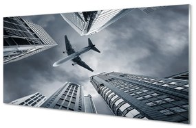 Obraz na skle Velkoměsto oblačnosti letoun nebe 100x50 cm