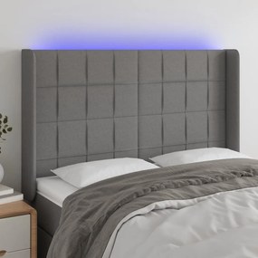 Čelo postele s LED tmavě šedé 147 x 16 x 118/128 cm textil 3124047