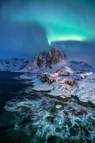 Fotografie Northern lights over snowcapped mountain, village, Natthawat, (26.7 x 40 cm)