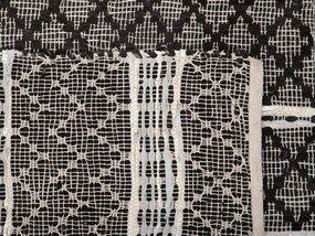 Kožený koberec 80 x 150 cm černý s béžovým FEHIMLI Beliani