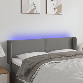 Čelo postele s LED tmavě šedé 147 x 16 x 78/88 cm textil 3123095