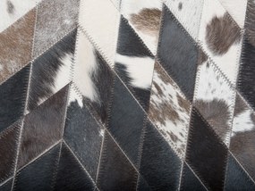 Černo-bílý kožený koberec, ⌀ 140 cm KELES Beliani