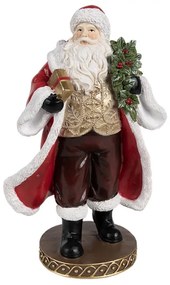 Červená vánoční dekorace Santa Claus na hnědém podstavci držící dárek a vánoční bobule – 23 cm