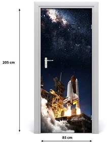 Fototapeta samolepící dveře startující raketa 85x205 cm