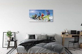 Obraz na skle Lyžaři zimní hory 140x70 cm