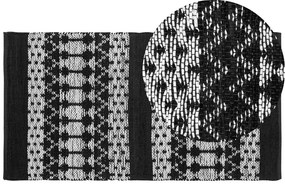 Kožený koberec 80 x 150 cm černý/béžový SOKUN Beliani