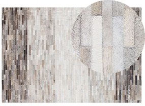 Hnědošedý kožený koberec 140 x 200 cm SINNELI Beliani