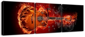 Gario Obraz s hodinami Hořící kytara - 3 dílný Rozměry: 90 x 30 cm