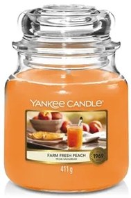 Vonná svíčka Yankee Candle FARM FRESH PEACH classic střední