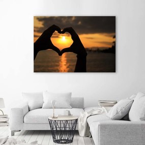 Obraz na plátně Ruce zformované do srdce Západ slunce - 90x60 cm