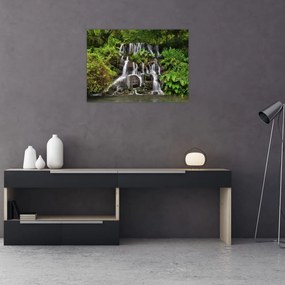 Skleněný obraz vodopádů v tropickém lese (70x50 cm)