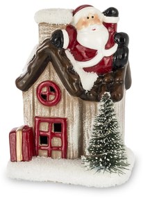 Vánoční dekorace Santa na střeše domku 159982