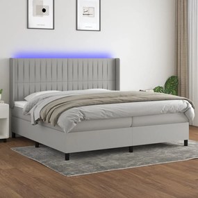 Box spring postel s matrací a LED světle šedá 200x200 cm textil