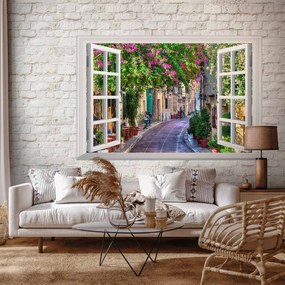 Fototapeta Toskánsko a Itálie - výhled na atmosférickou ulici s barevnými květy